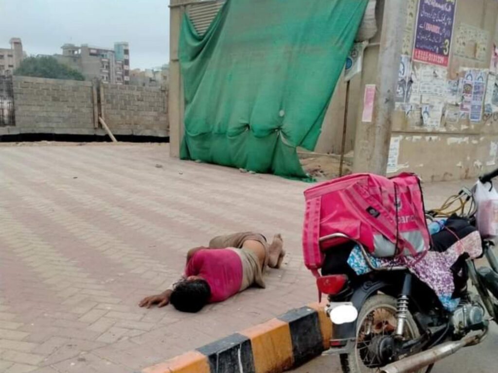 Foodpanda Rider’s Viral Picture of Sleeping on Footpath after the ...